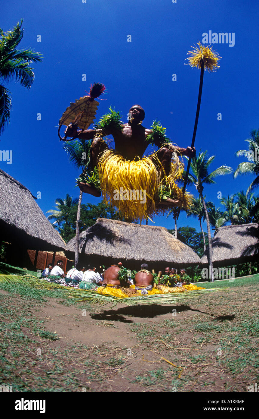 Fijian warrior leaps in the air during meke dance Stock Photo - Alamy