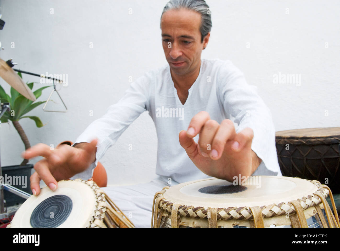 musician plays on tabla drums Stock Photo - Alamy