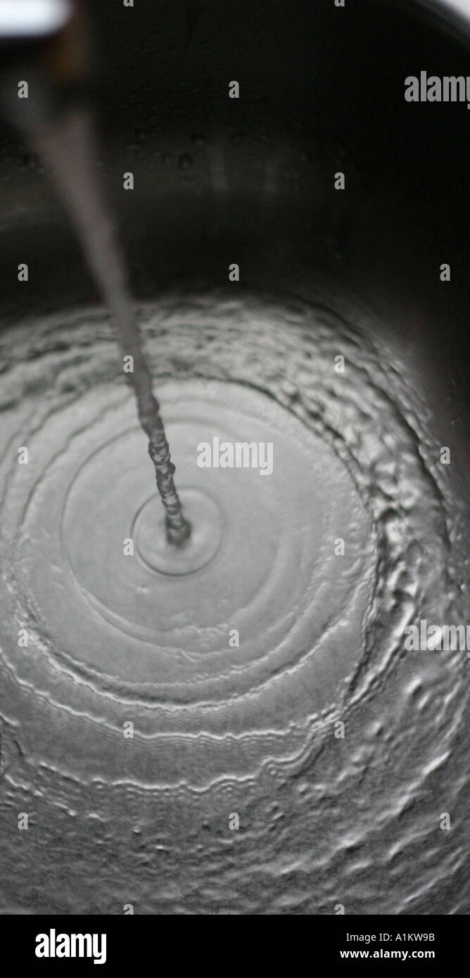 Running the tap while cleaning your teeth hi-res stock photography and ...