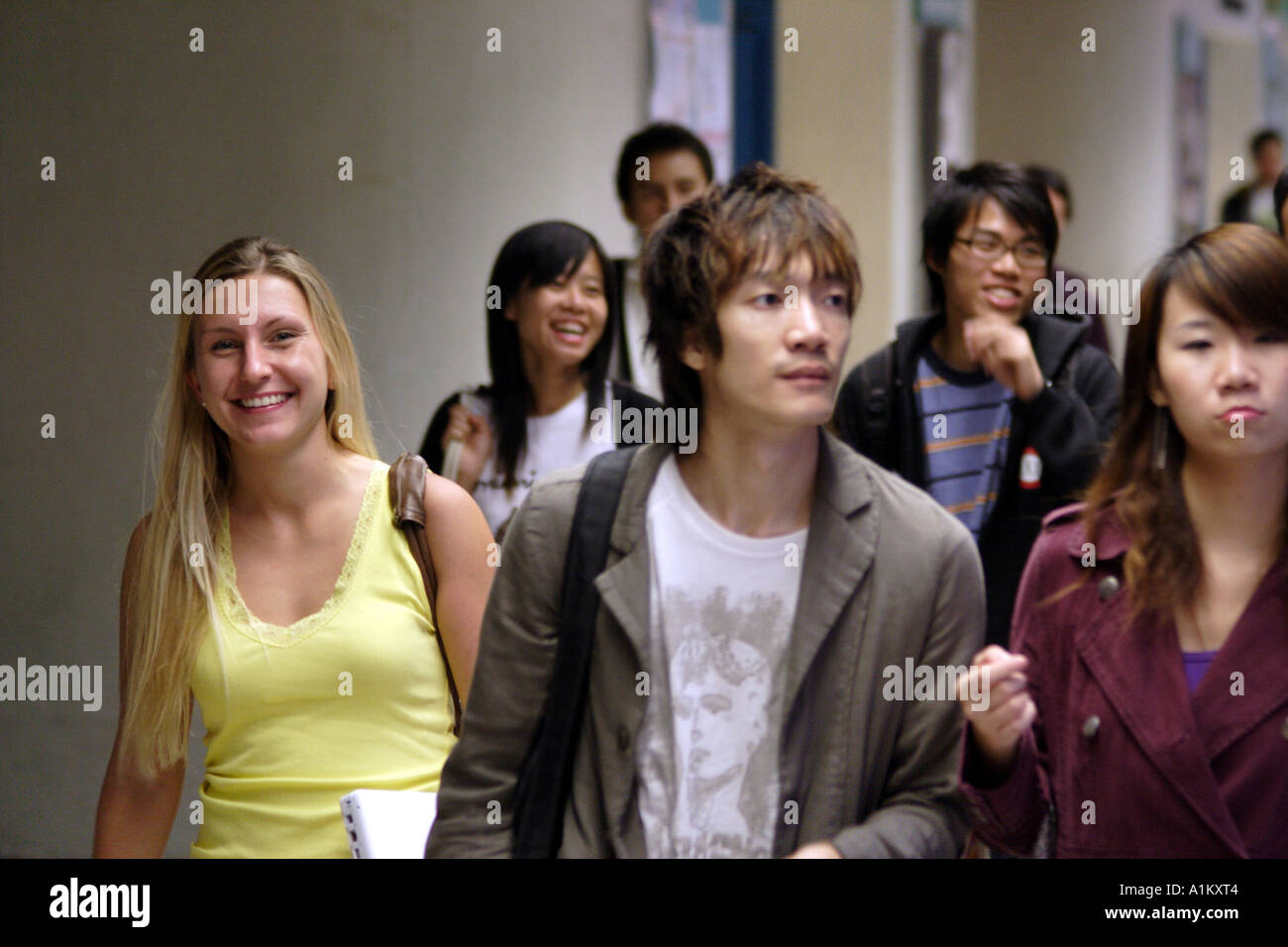 Students walk along a university hallway in Hong Kong Stock Photo - Alamy