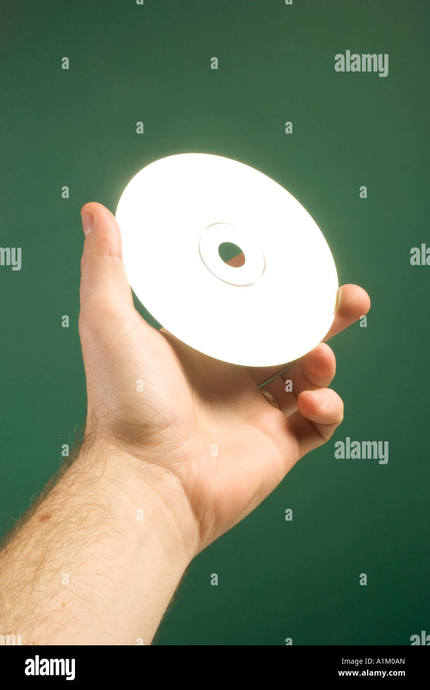 hand holding compact disc Stock Photo - Alamy