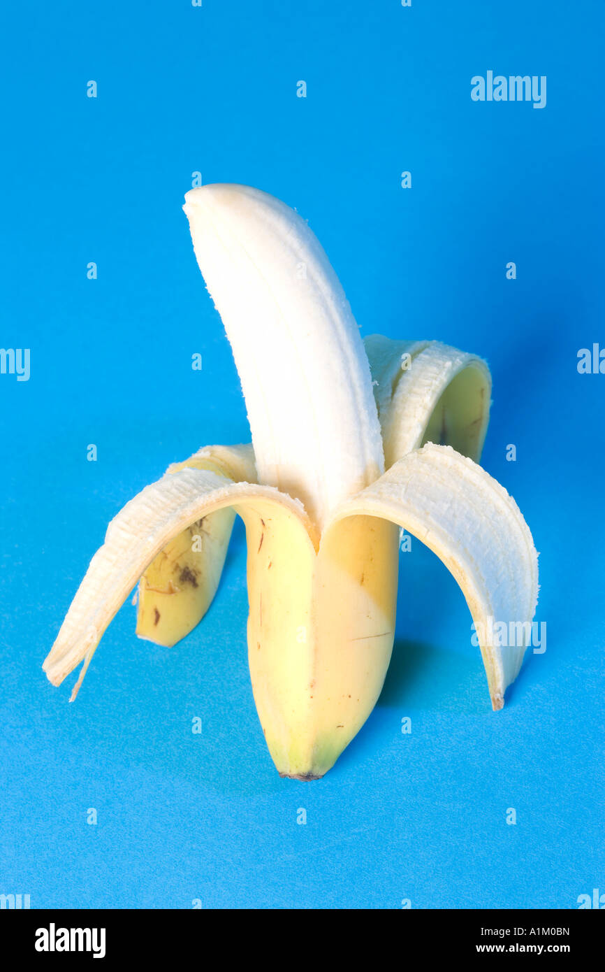 half peeled banana Stock Photo - Alamy
