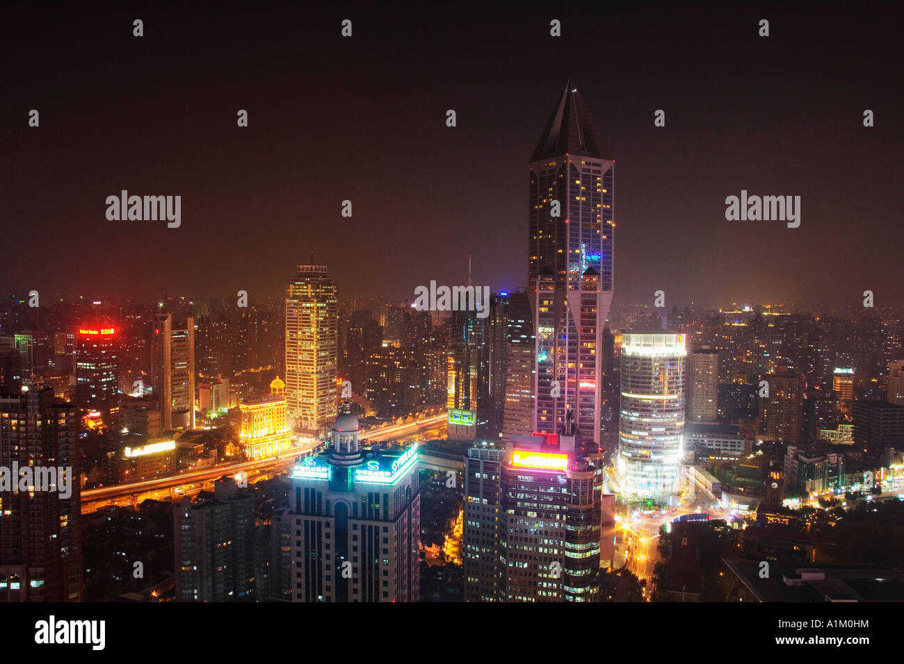 Night view of illuminated Tomorrow Square Shanghai China Stock Photo ...