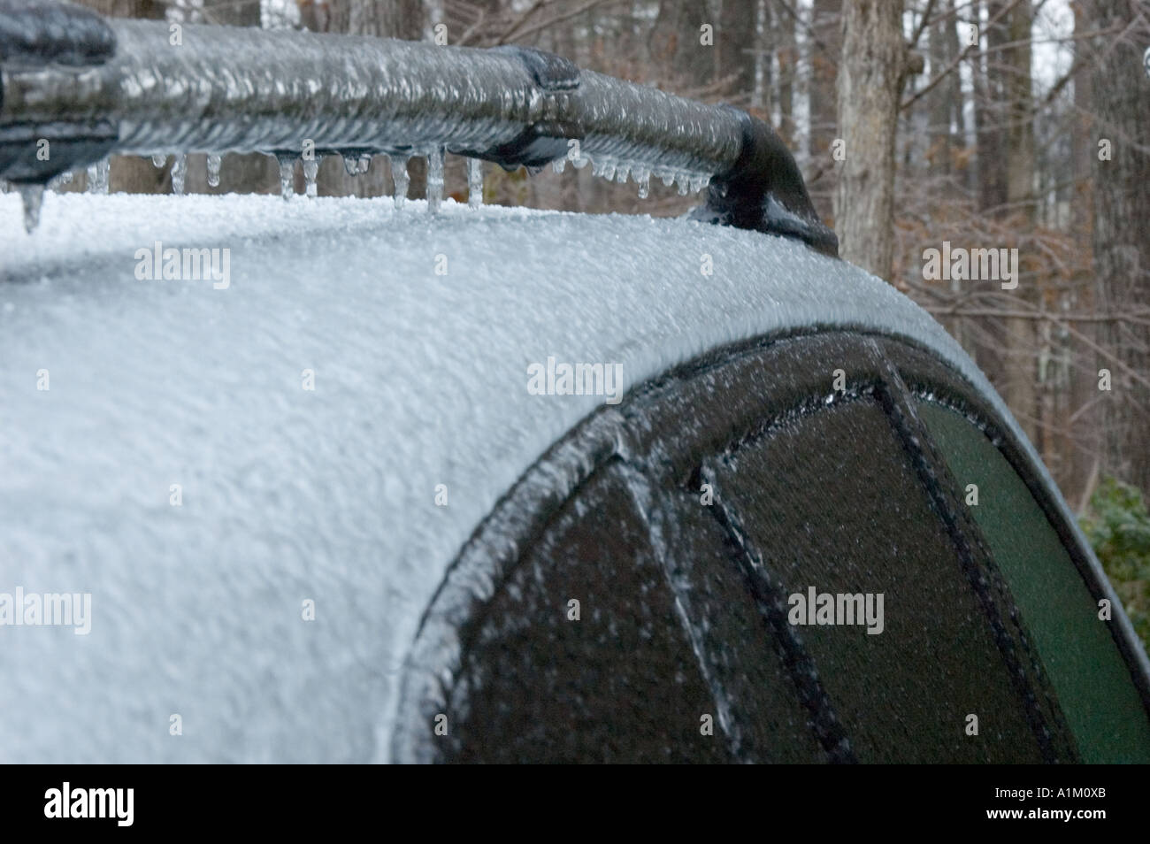Ice covered car after ice storm Stock Photo - Alamy