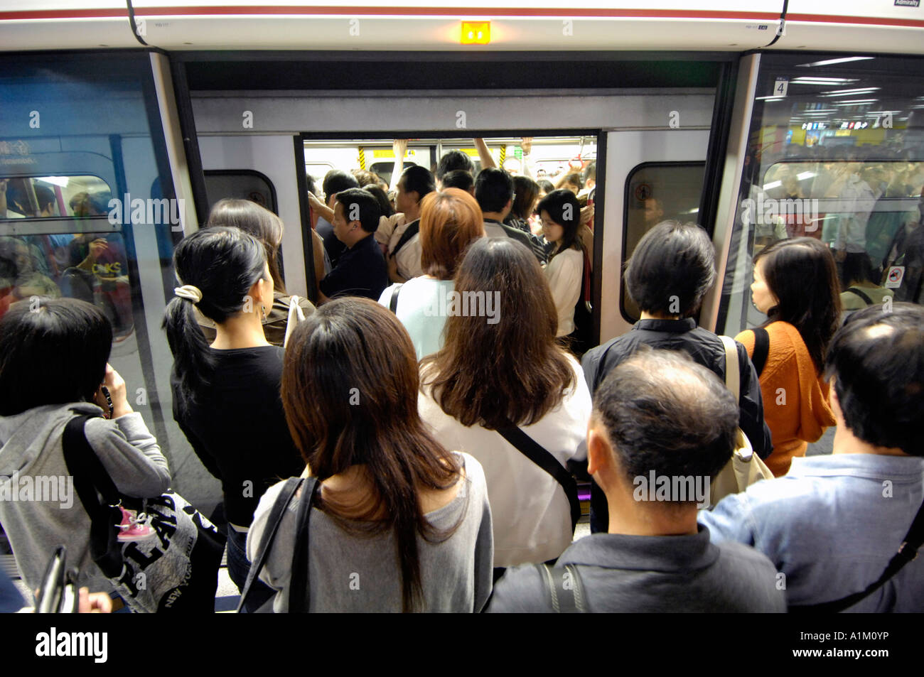 People lining up for the subway at rush hour at the Admiralty MTR ...