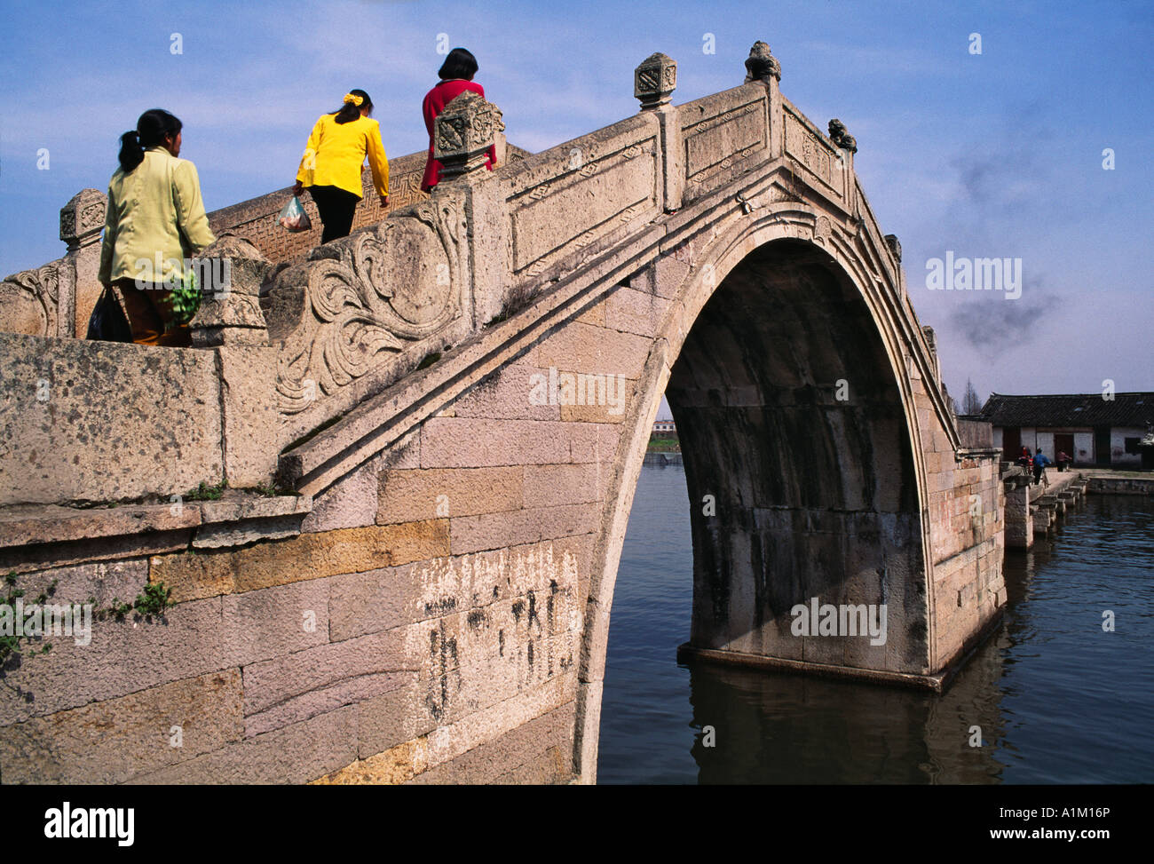 Ancient stone arch bridge over the Grand Canal in watertown Shaoxing ...