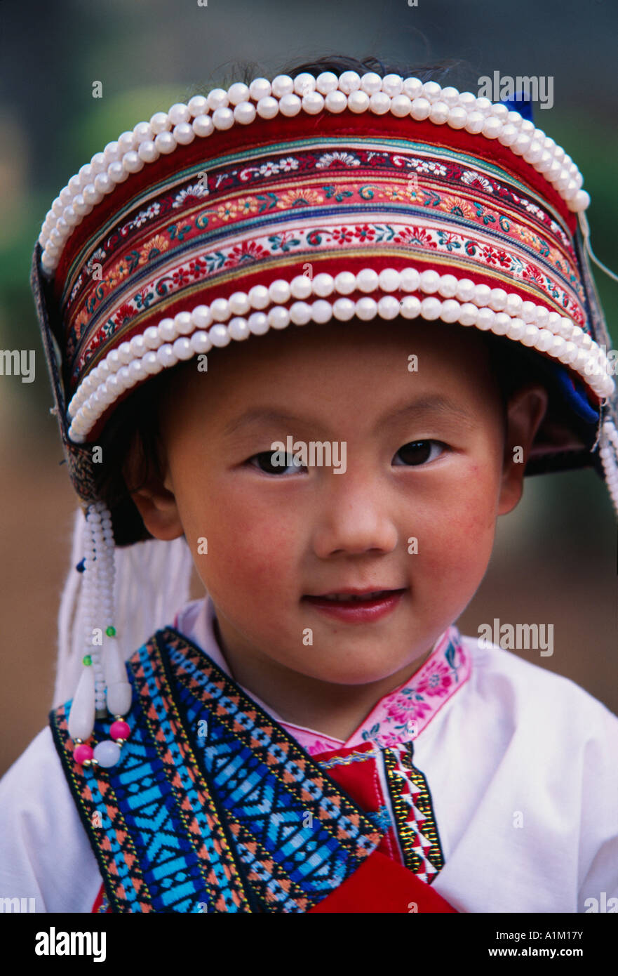 China Yunnan Province Sani girl in traditional costume Stock Photo - Alamy