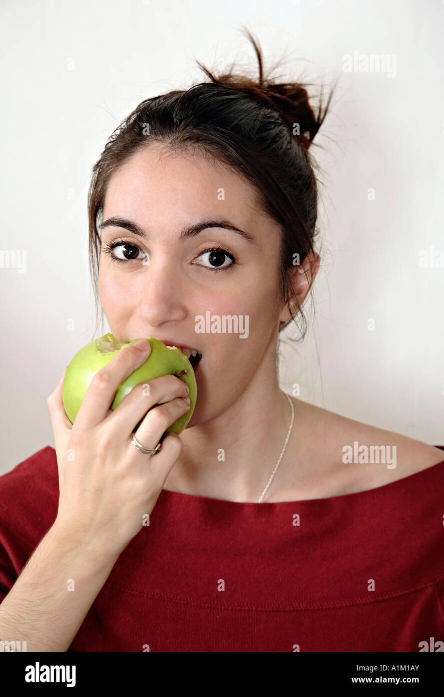 Eating an apple Stock Photo - Alamy