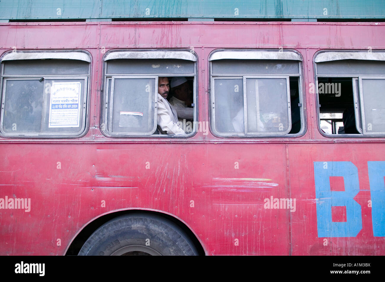 Passenger on a bus looking out the window in Dhaka Bangladesh Stock ...