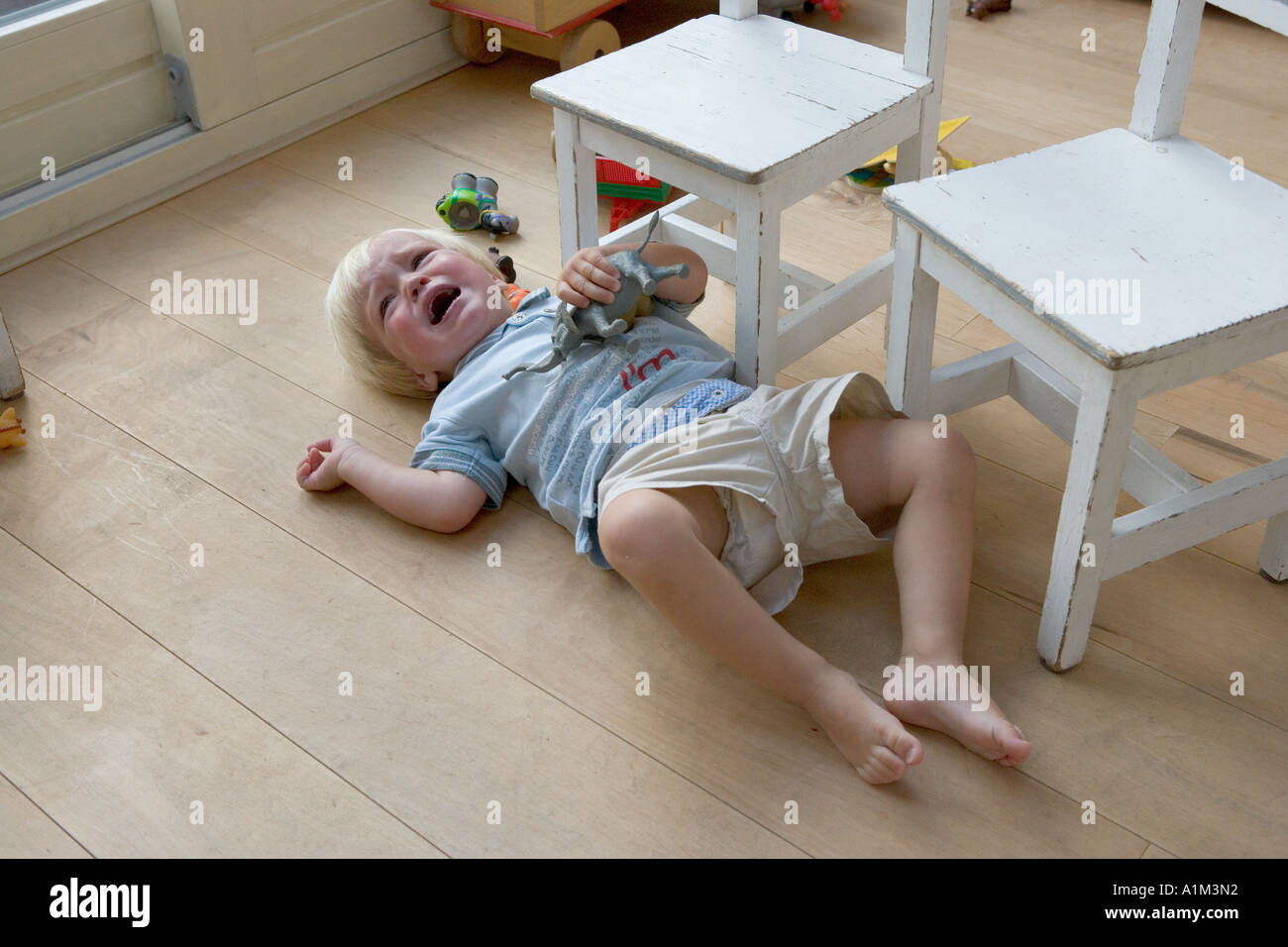 Crying child daycare hi-res stock photography and images - Alamy