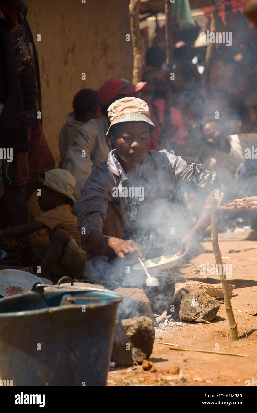 Cooking in a village market in Madagascar Stock Photo - Alamy