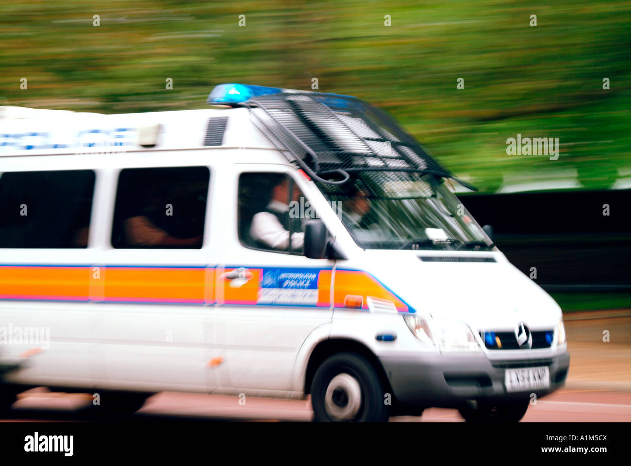 Speeding police van, London Stock Photo - Alamy
