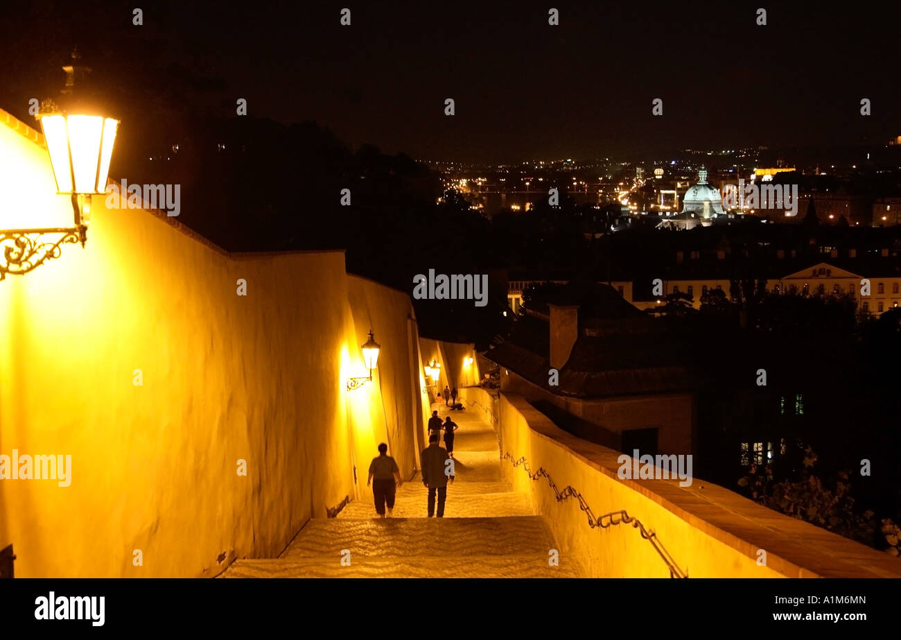 Prague castle steps people by night mood atmospheric Stock Photo - Alamy