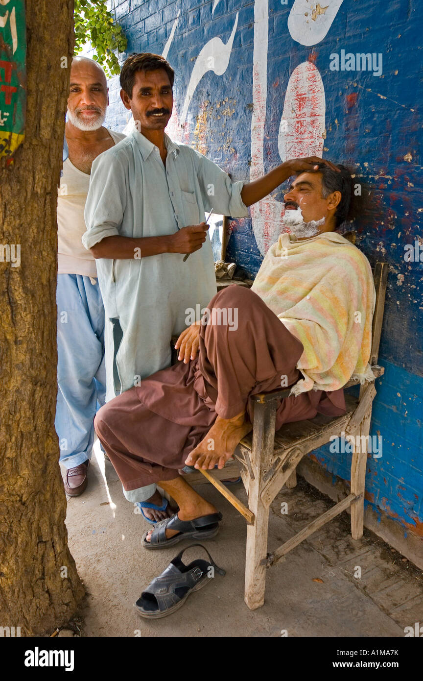 Outdoor barber, Multan, Punjab Province, Pakistan Stock Photo - Alamy