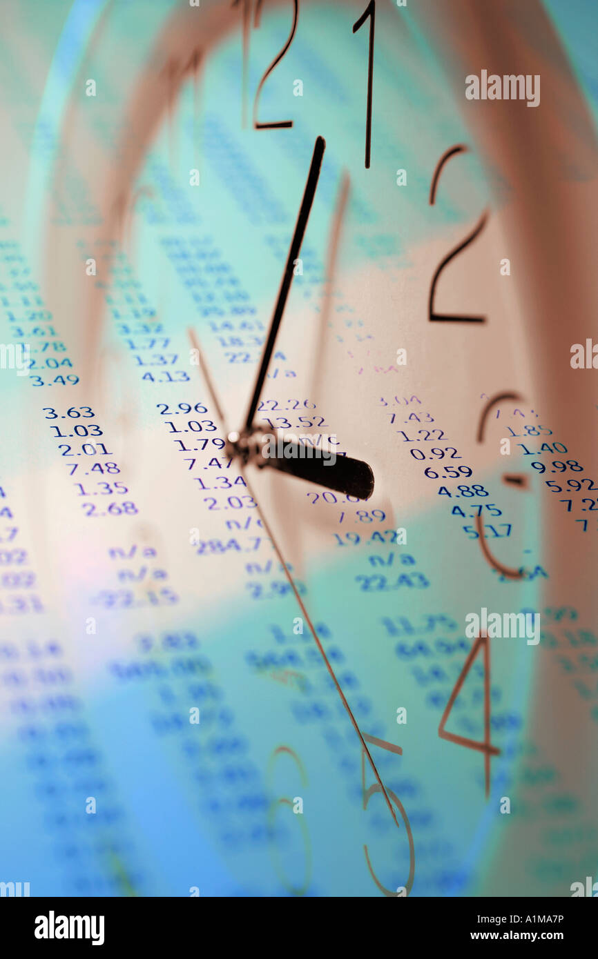 Clock with Stock Listings Stock Photo - Alamy