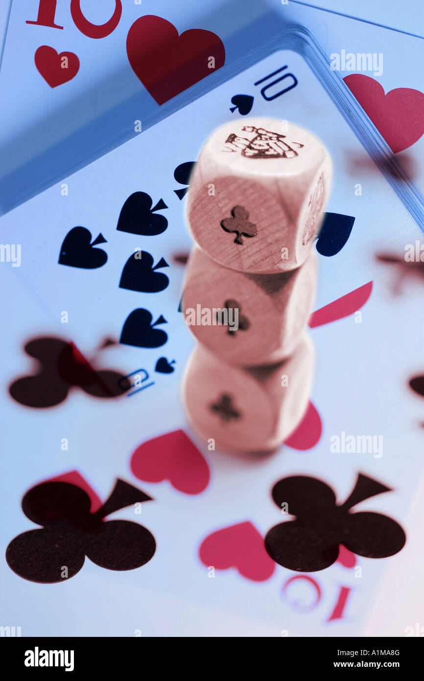Stack of Dice on Playing Cards Stock Photo - Alamy