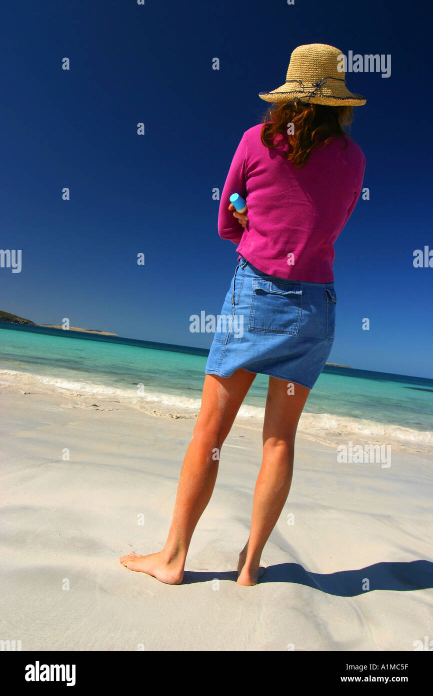 Lady on the beach Stock Photo - Alamy