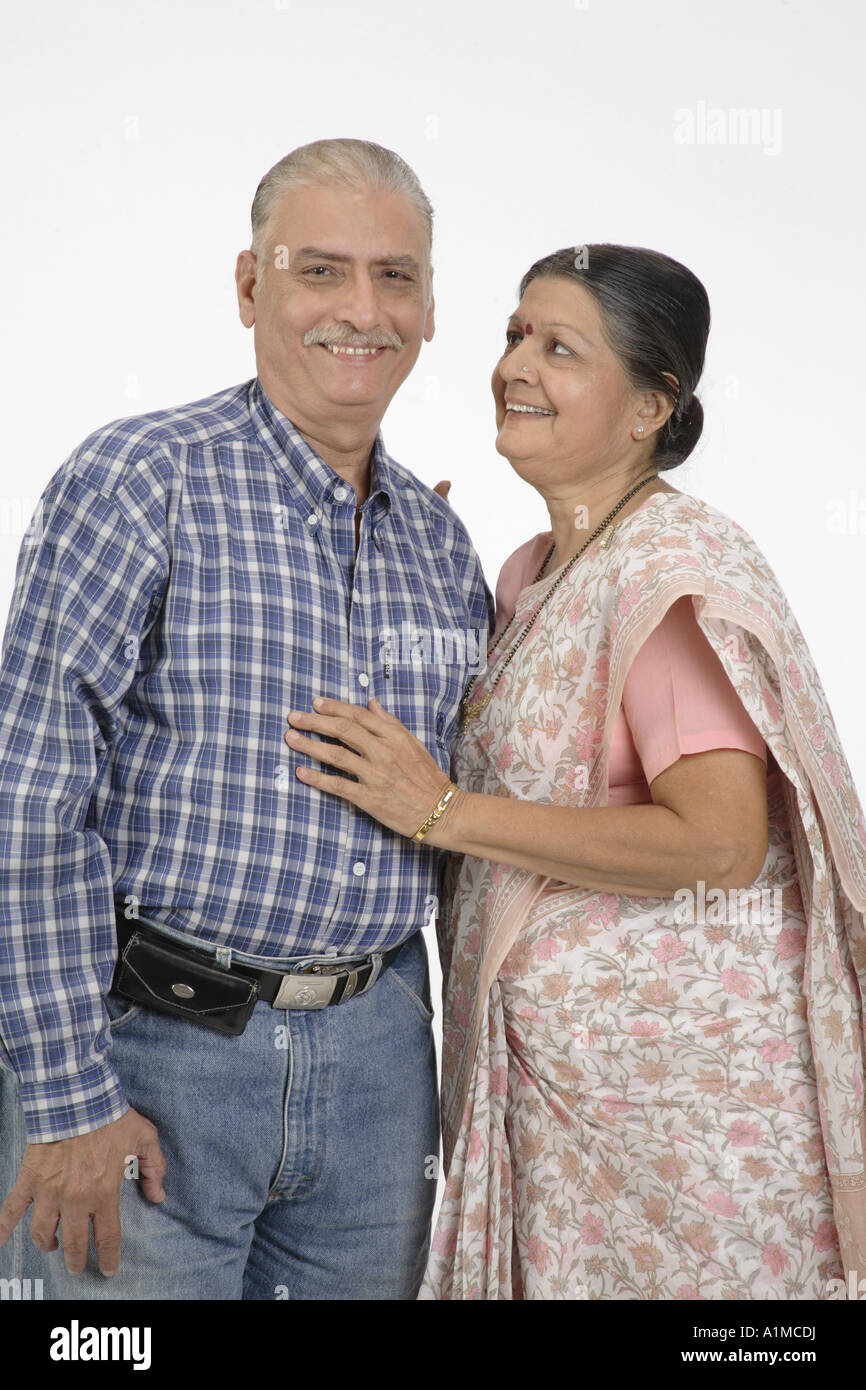 Happy Indian senior citizen couple on white background Stock Photo - Alamy