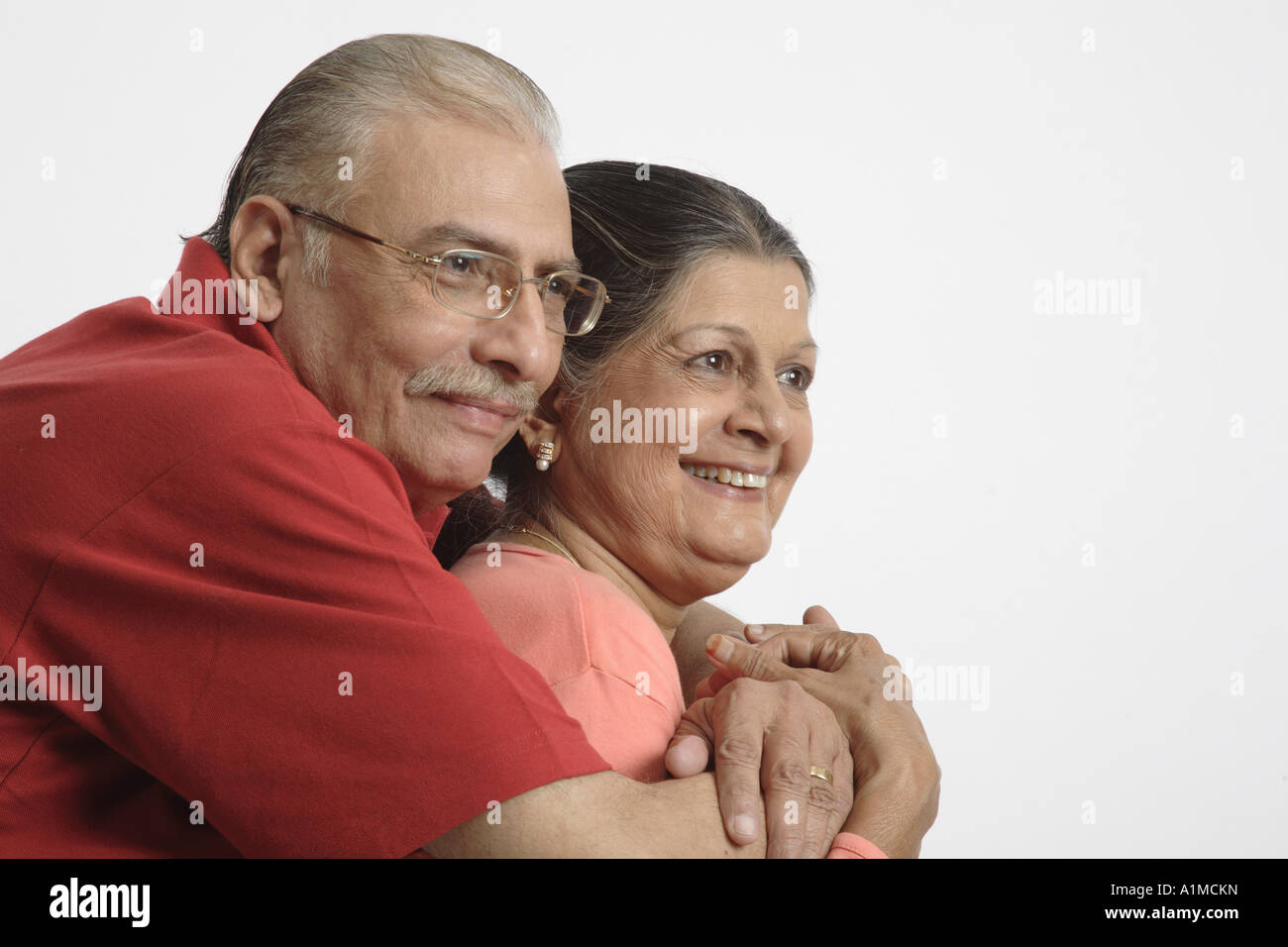 Happy Indian senior citizen couple on white background Stock Photo - Alamy