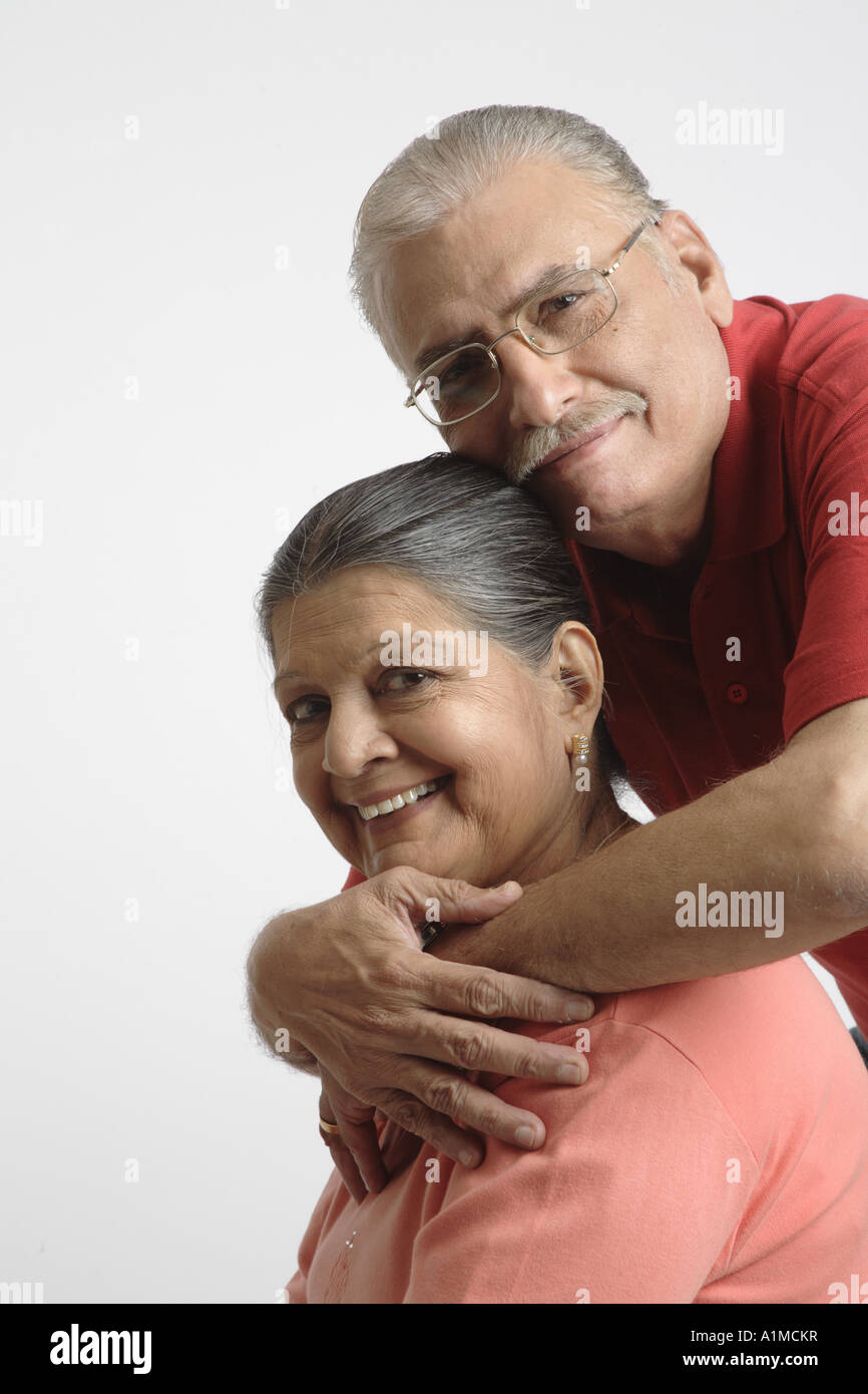 Happy Indian senior citizen couple on white background Stock Photo - Alamy
