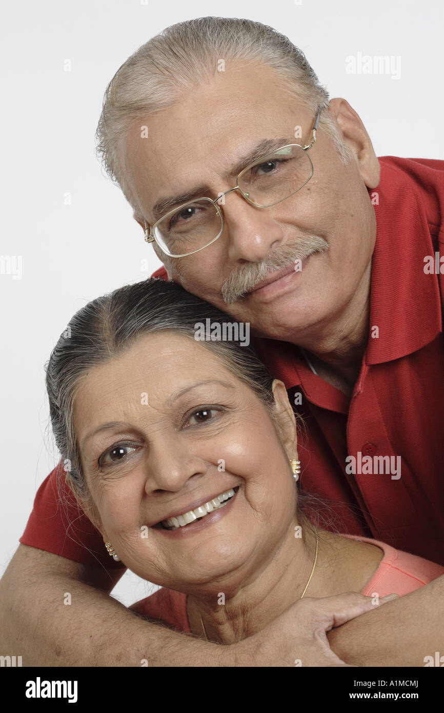 Happy Indian senior citizen couple on white background Stock Photo - Alamy