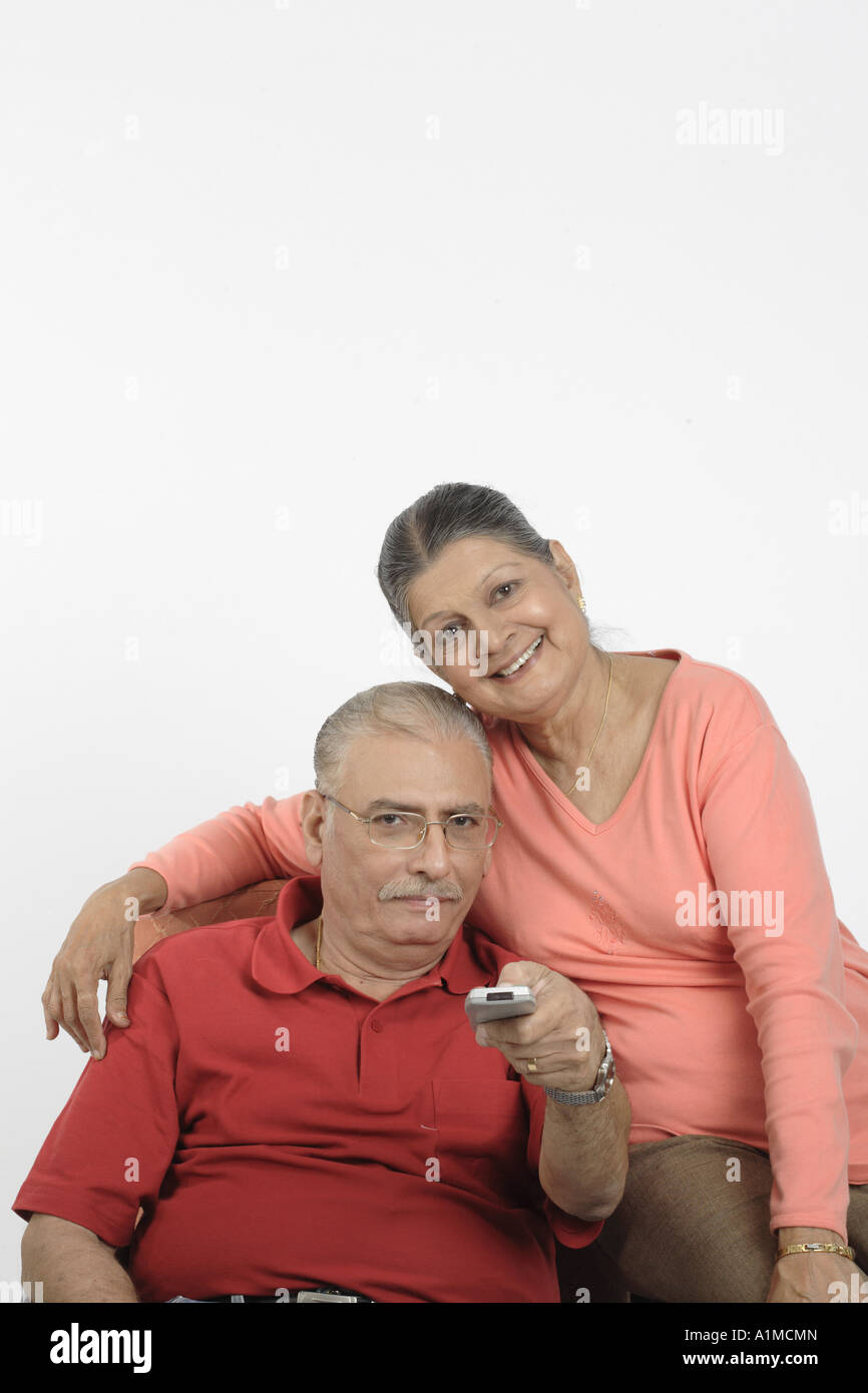 Happy Indian senior citizen couple on white background Stock Photo - Alamy