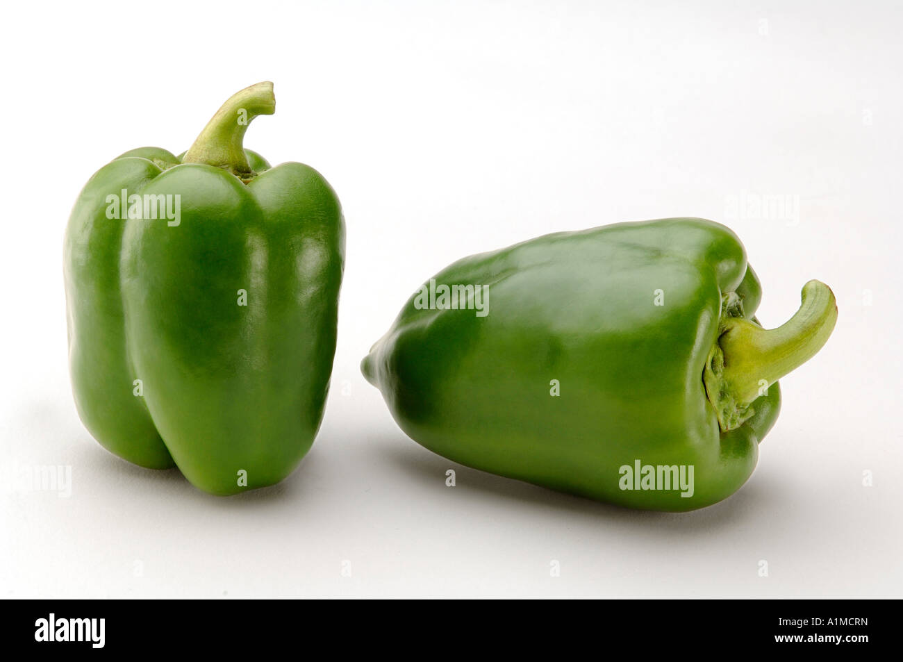 Green Capsicum with white background Stock Photo - Alamy