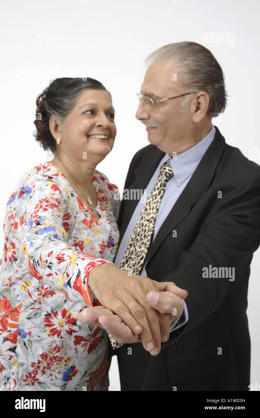 Indian senior citizen couple husband wife hand in hand Stock Photo - Alamy