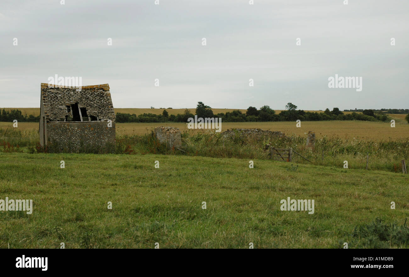 Disused building in a field Stock Photo - Alamy