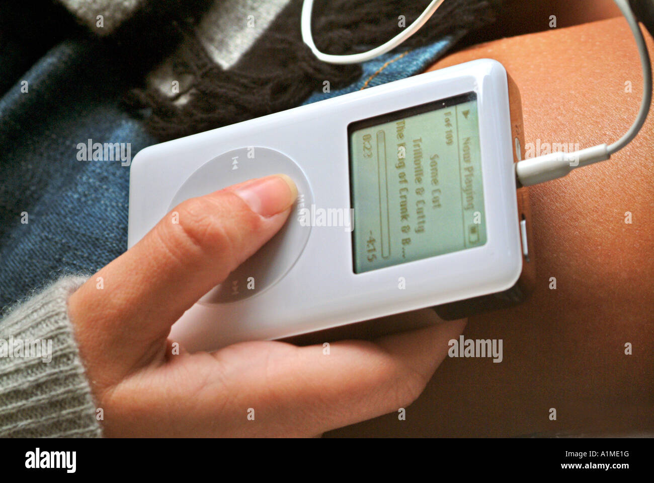 hands holding mp3 music player Stock Photo - Alamy