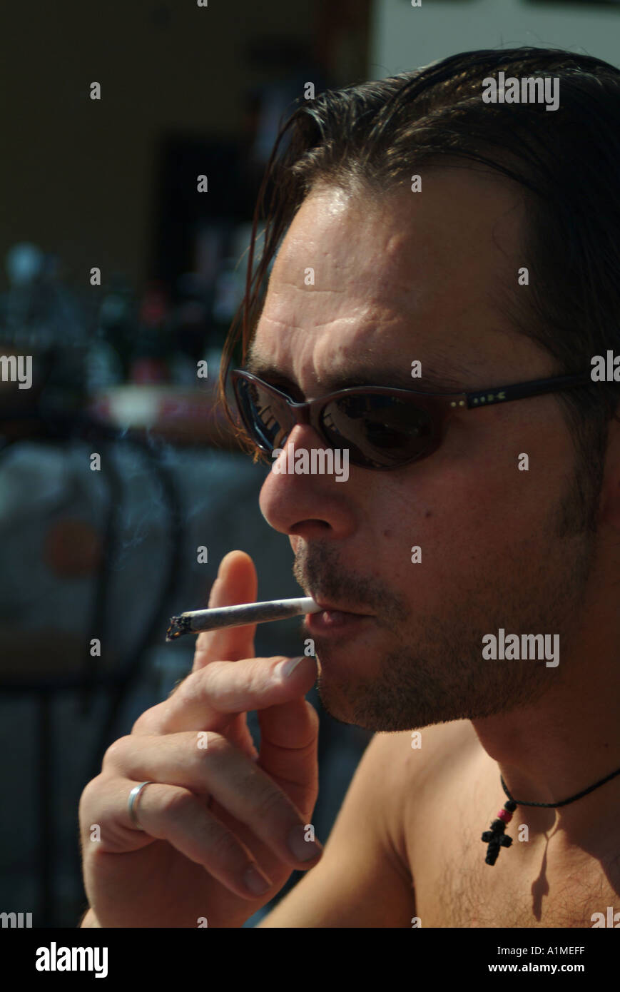 Portrait dark swarthy unshaven smoking shades sunglasses people hi-res ...