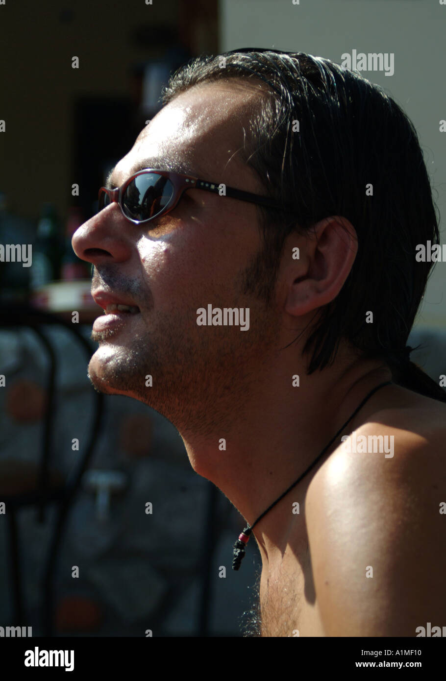 Portrait dark swarthy unshaven smoking shades sunglasses people hi-res ...