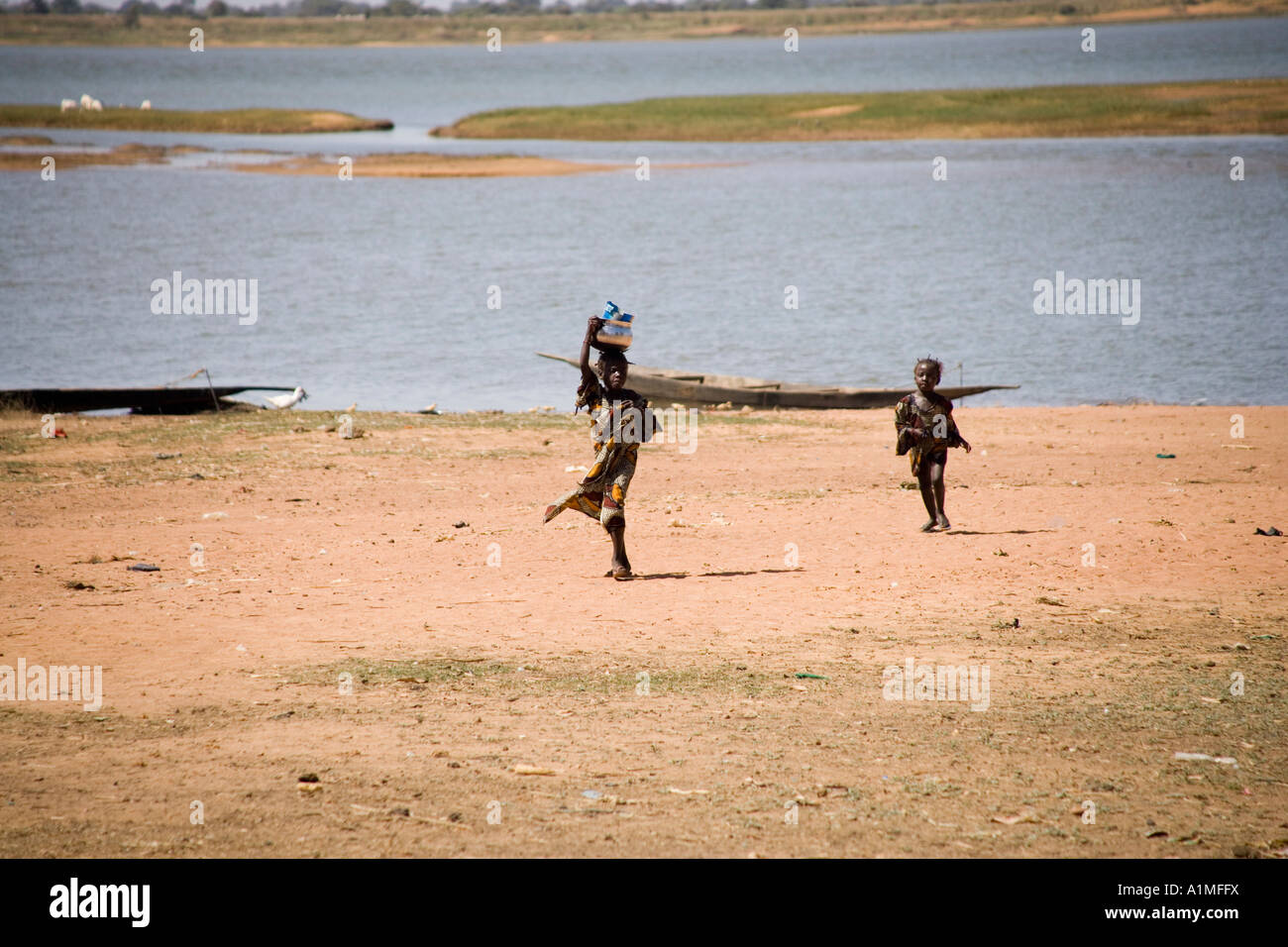 Children working Niger river by the town of Segoukoro the old Segou ...