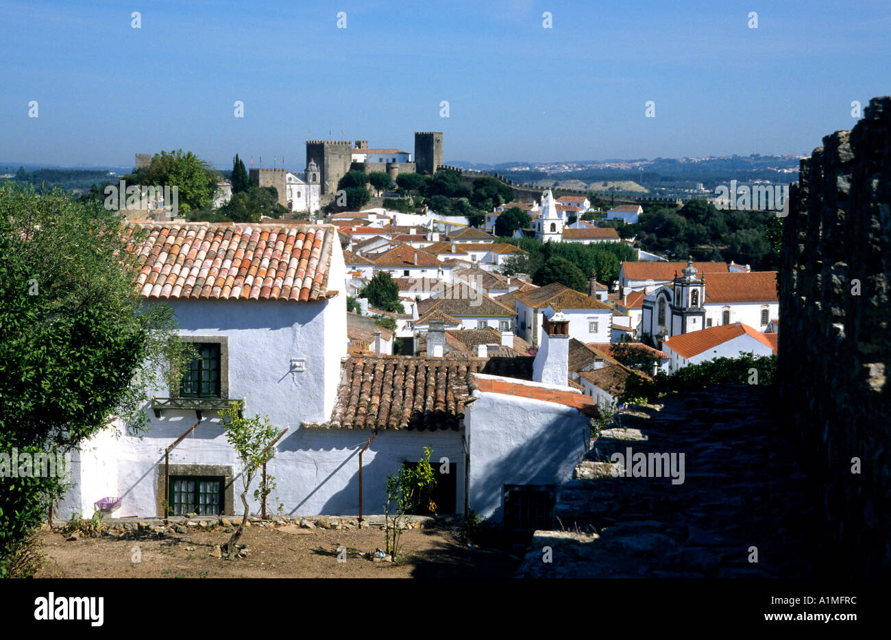 Portugal Obidos whitewashed houses castle walls Stock Photo - Alamy