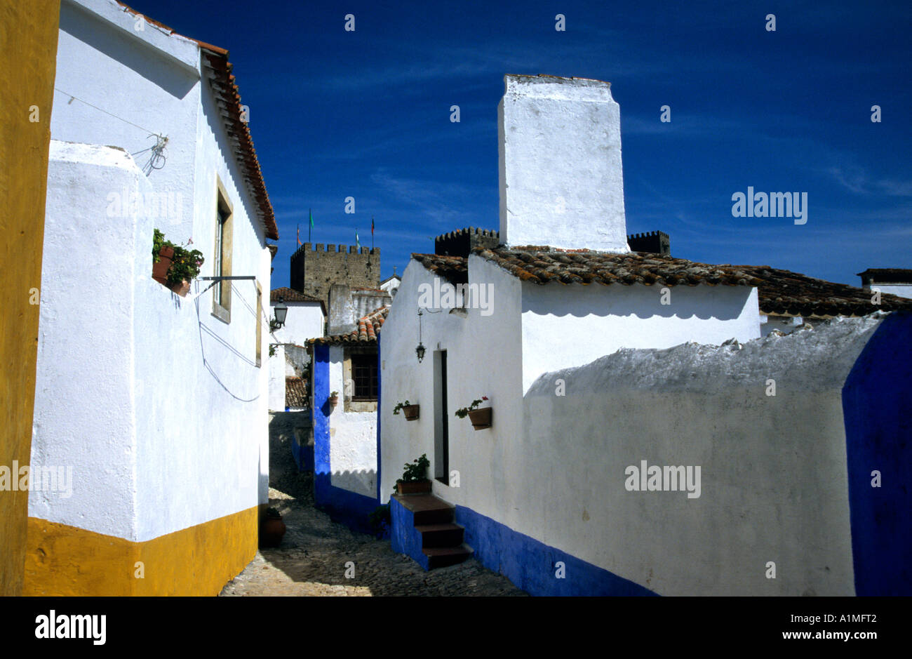 Portugal Obidos whitewashed houses castle walls Stock Photo - Alamy