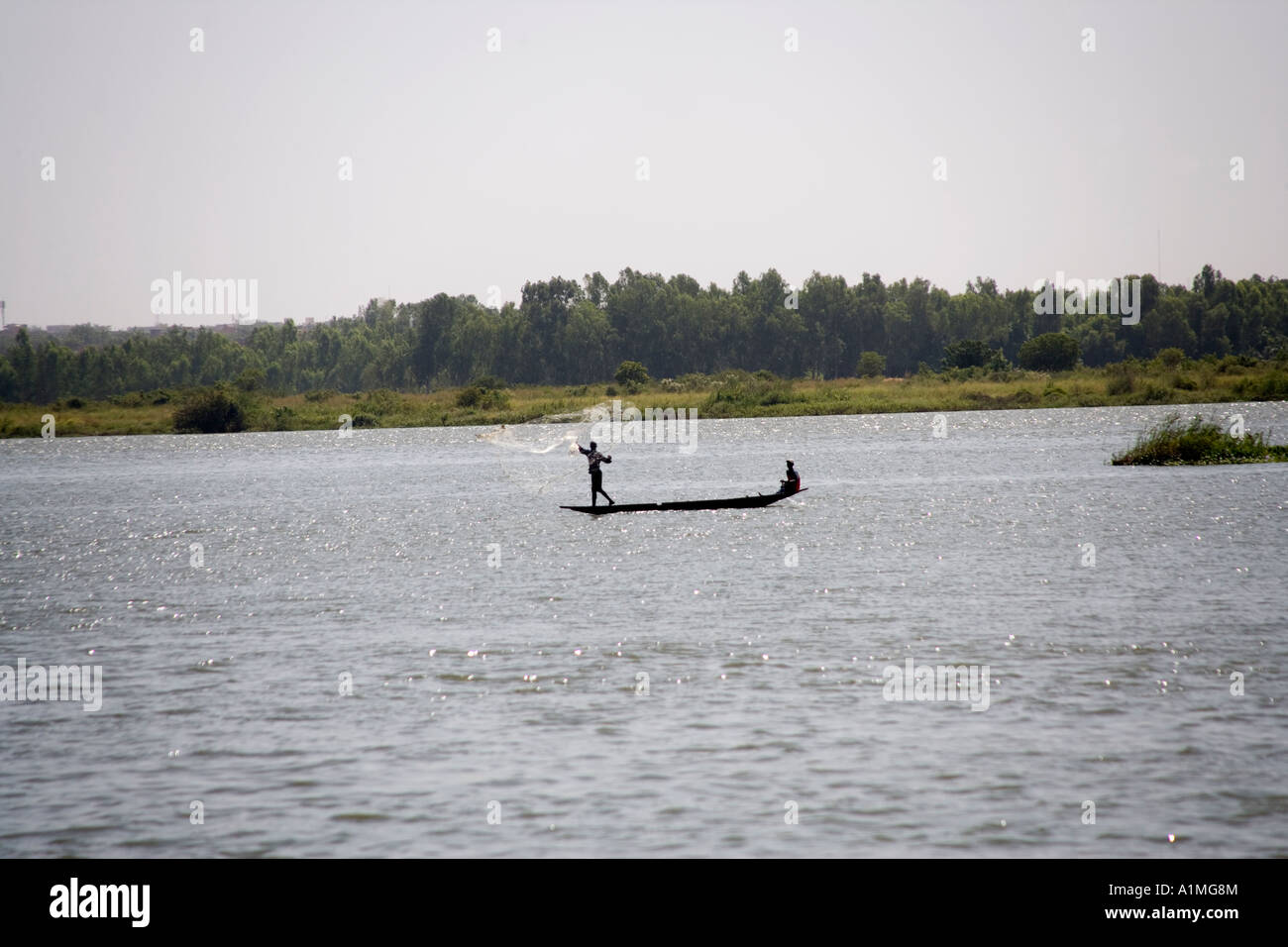 Fishing from wooden canoes on the Niger river,Bamako, Mali,West Africa ...