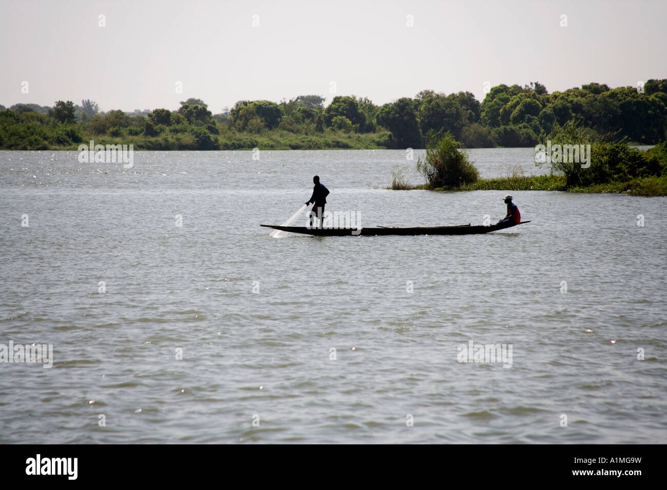 Fishing from wooden canoes on the Niger river,Bamako, Mali,West Africa ...