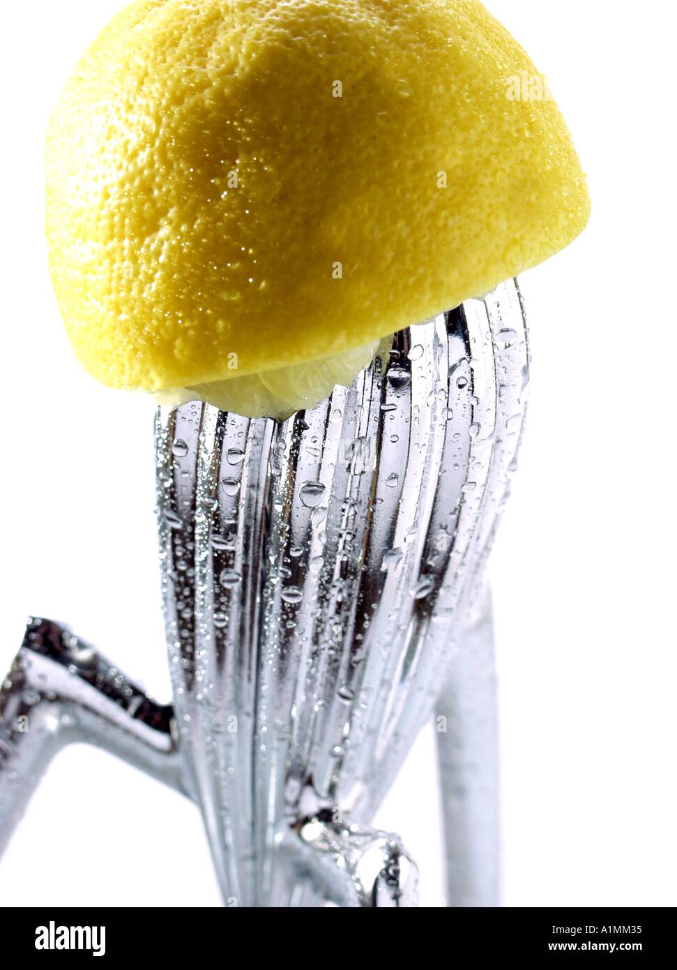 Lemon being squeezed hi-res stock photography and images - Alamy