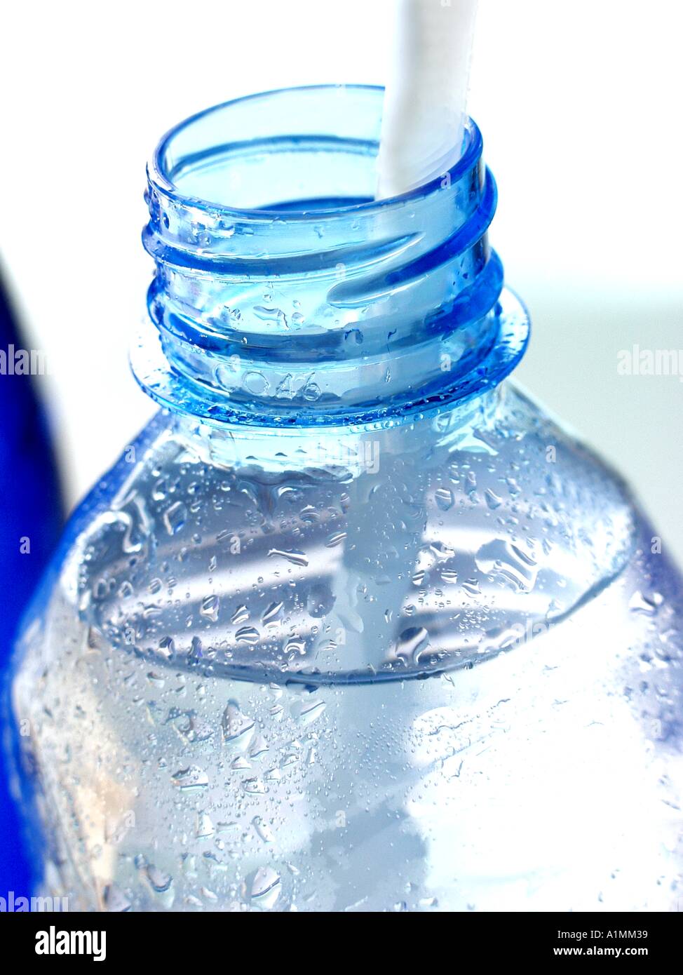 Mineral water bottle with straw 2 Stock Photo - Alamy