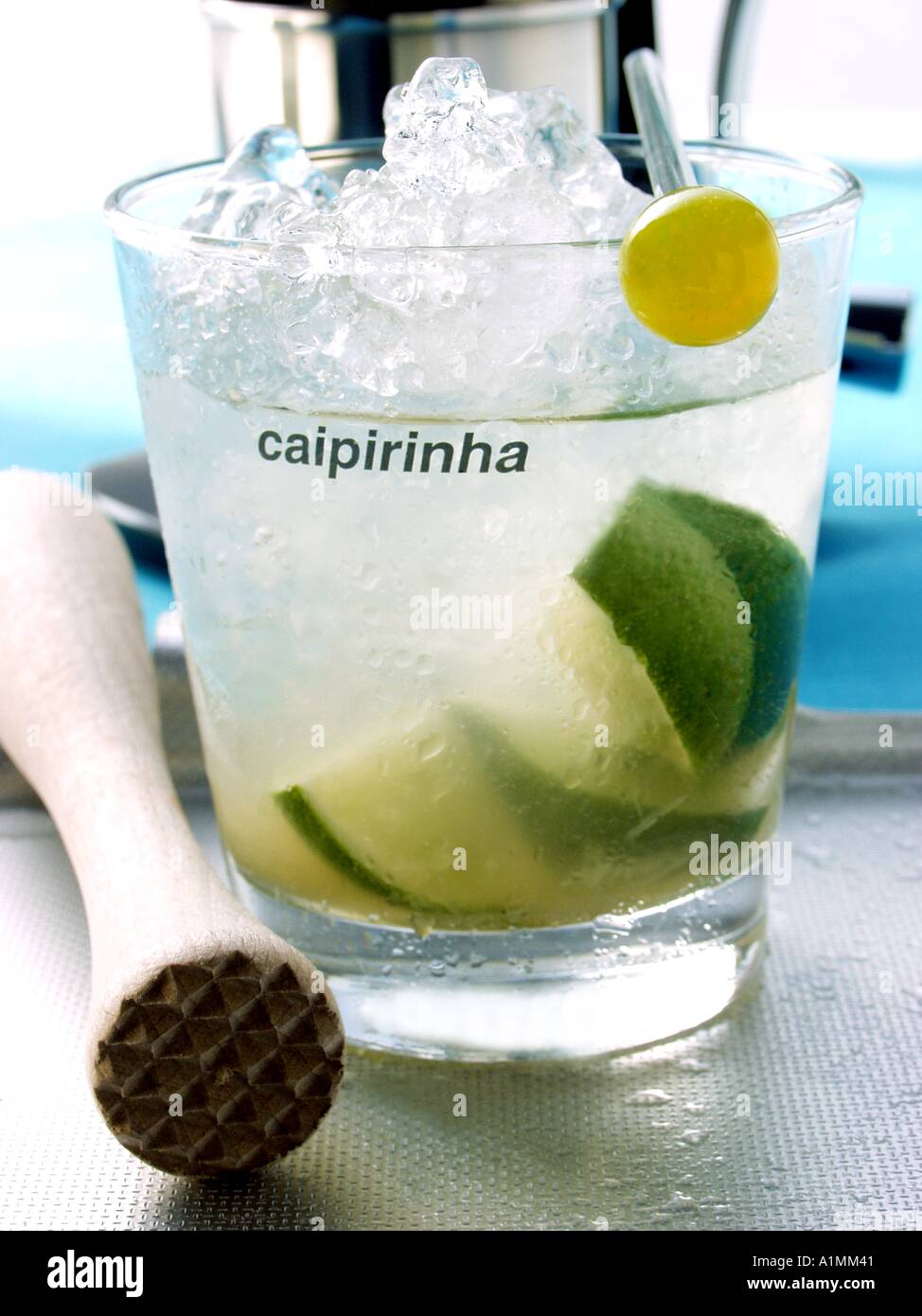 Caipirinha with ice cubes wooden pestle 1 Stock Photo - Alamy