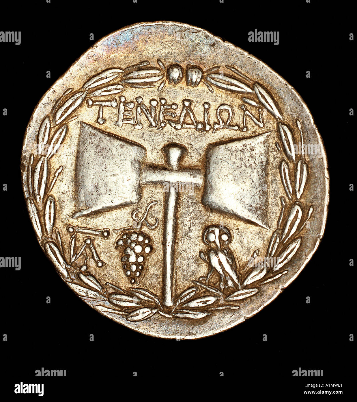 Twinheaded Axe symbol of Dionysus Stock Photo - Alamy
