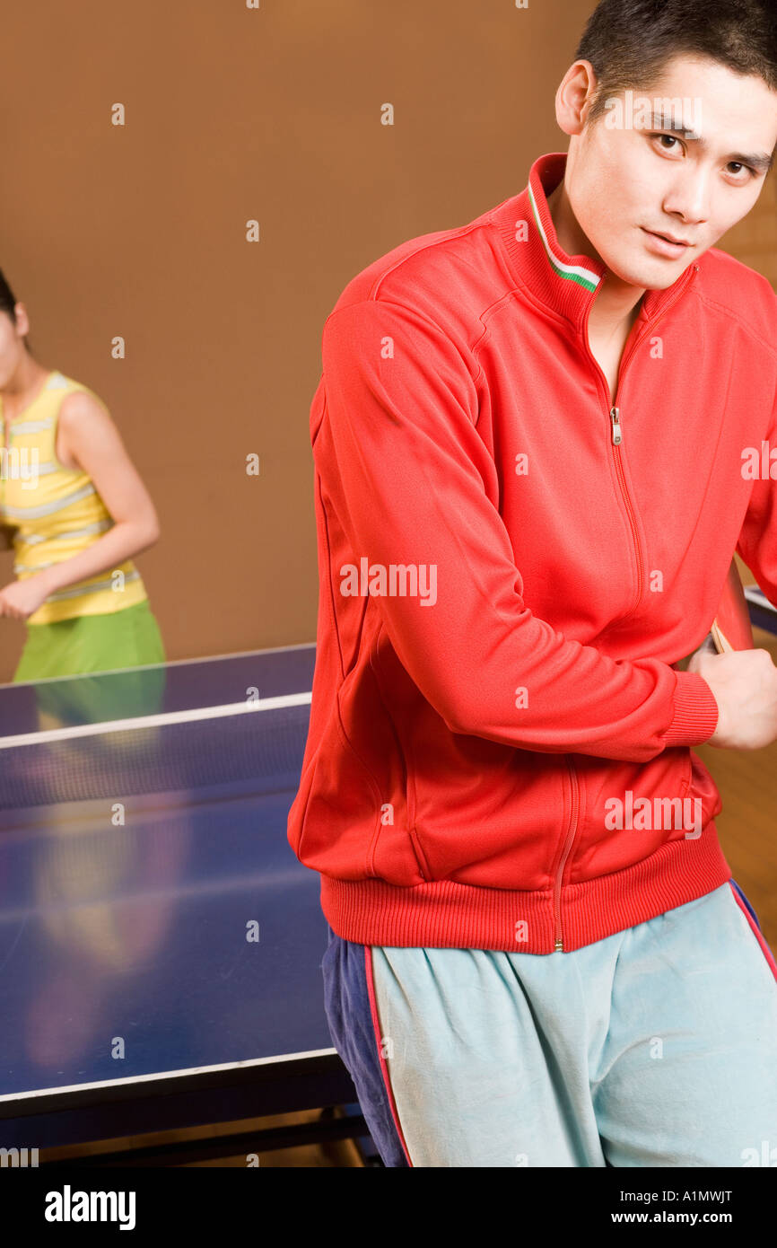 Young men playing table tennis Stock Photo - Alamy