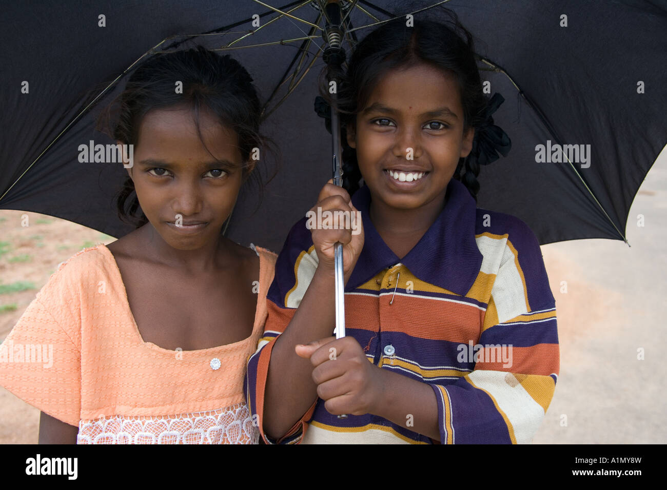 Local Tamil children in the village of Karaikudi in the Chettinad area ...