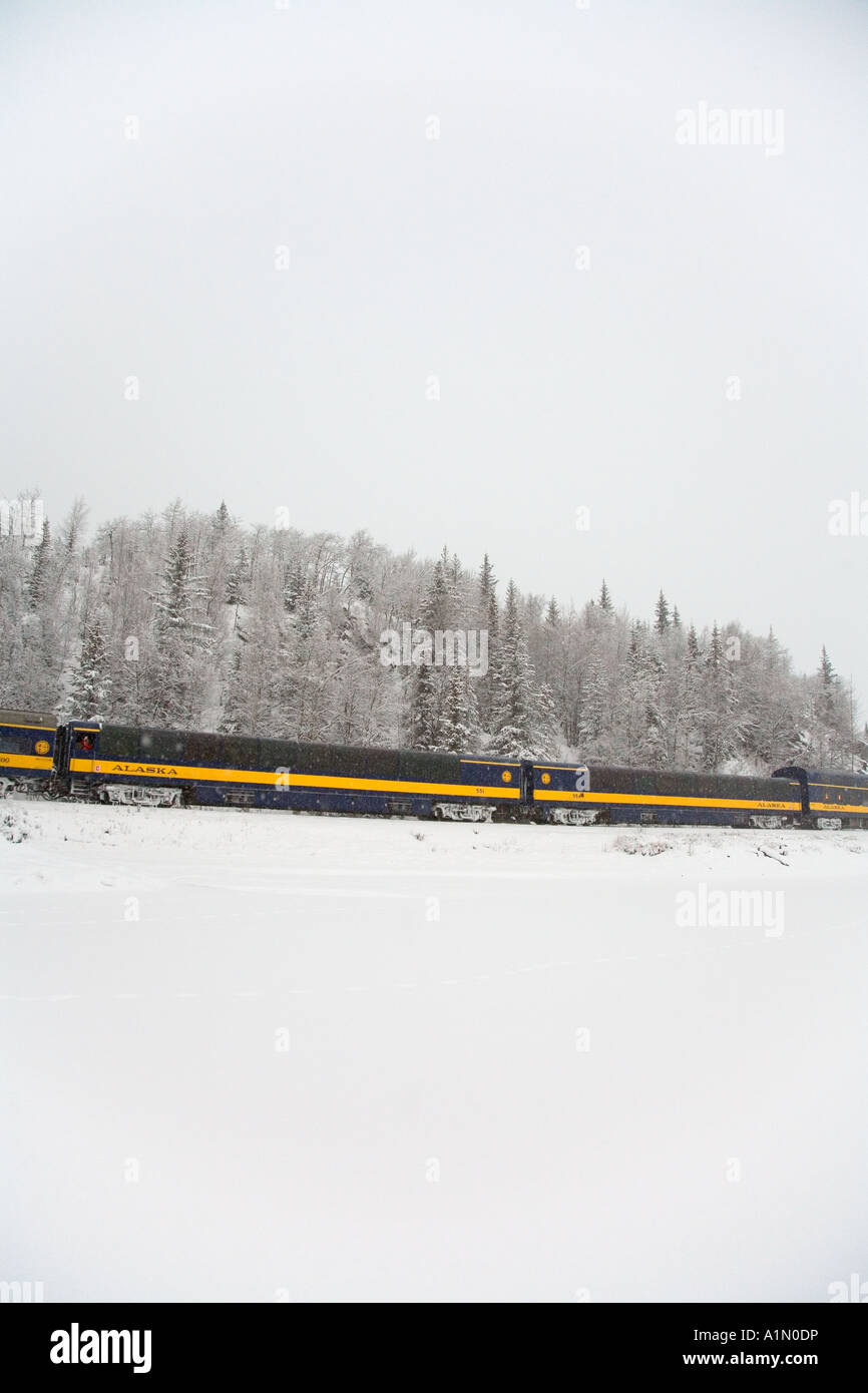 The Alaska Railroad travels along Lower Trail Lake during the winter ...
