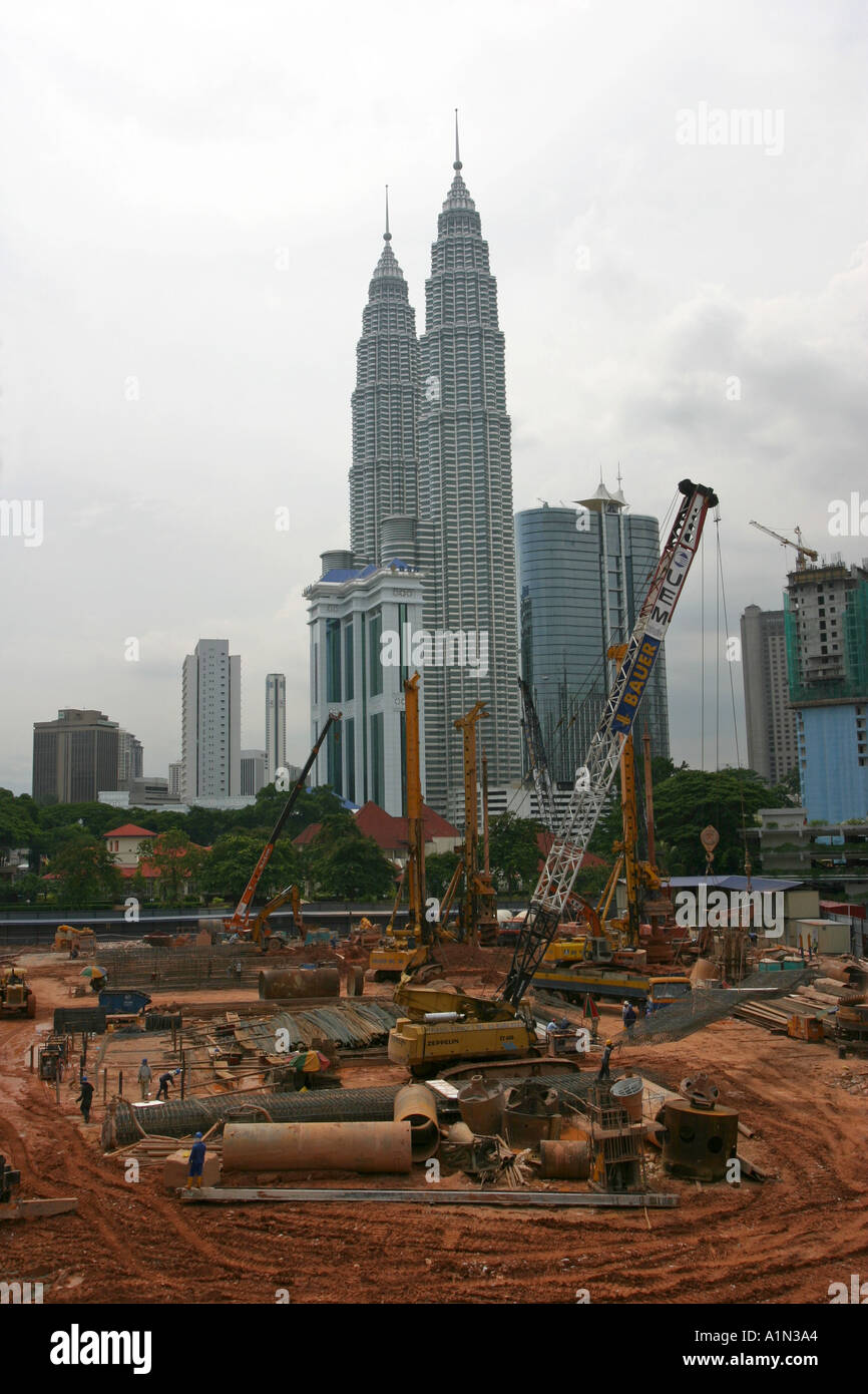 The world famous Petronas towers viewed across an urban development ...