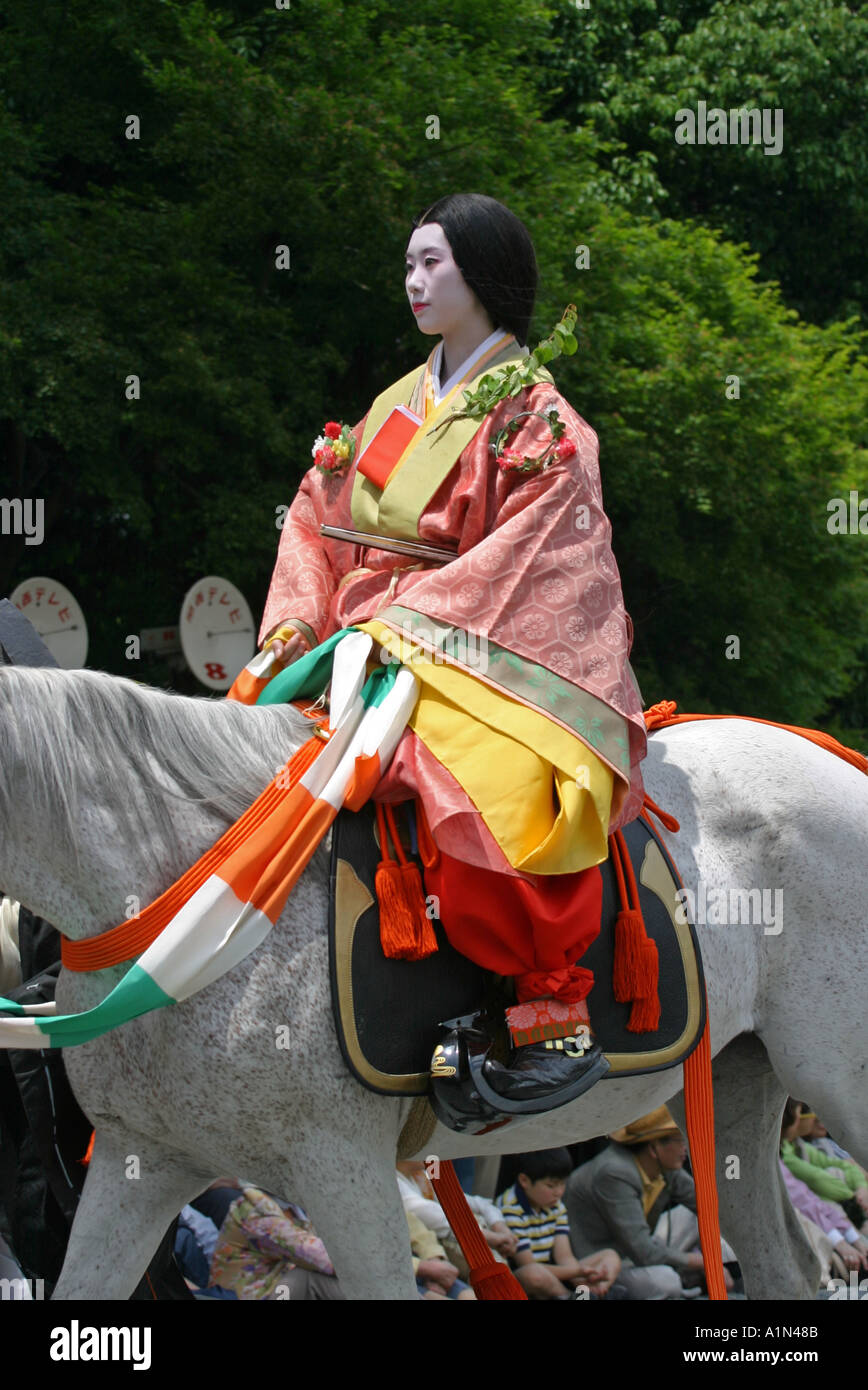 Japanese woman riding horseback wearing a 6th century costume in the ...