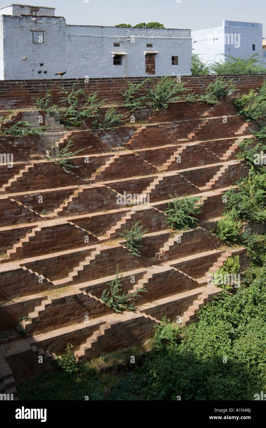 Complex of steps leading down into a large water tank used to store ...