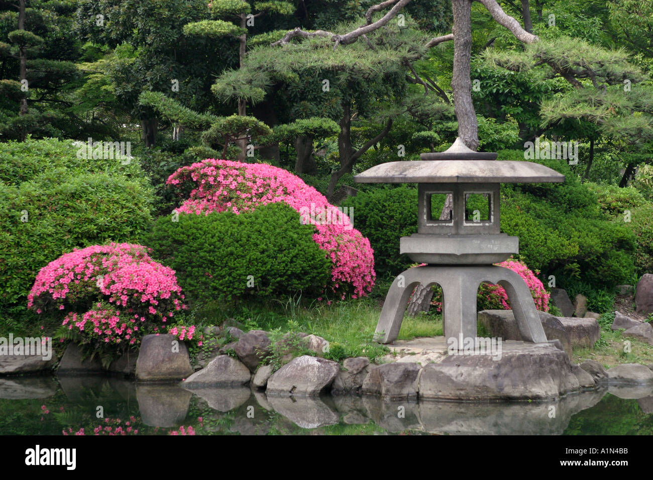 Iconic classical stone lantern in a traditional Japanese garden in the ...