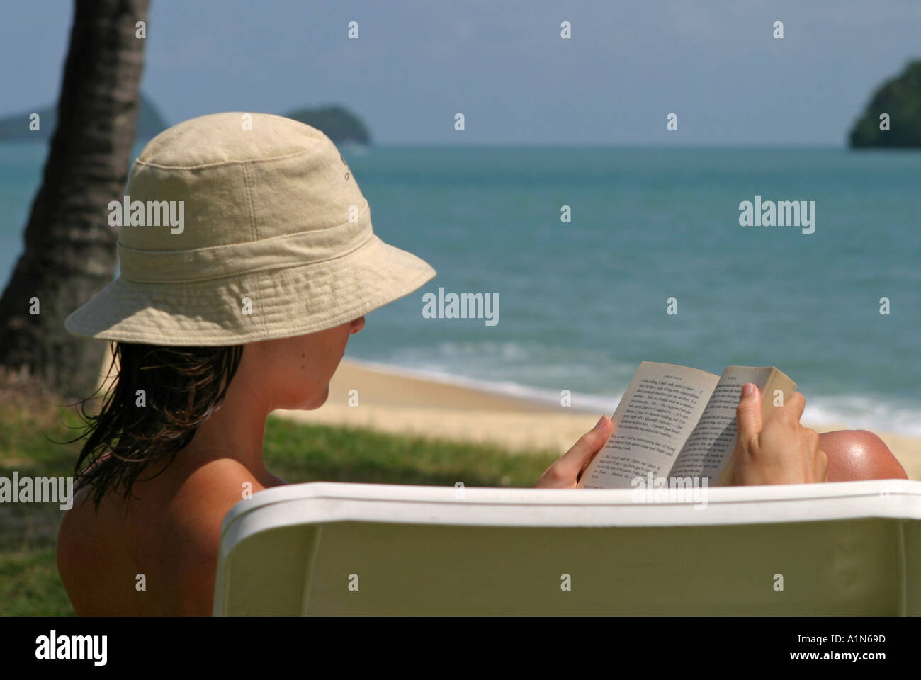 Beautiful woman sunbathing hi-res stock photography and images - Alamy
