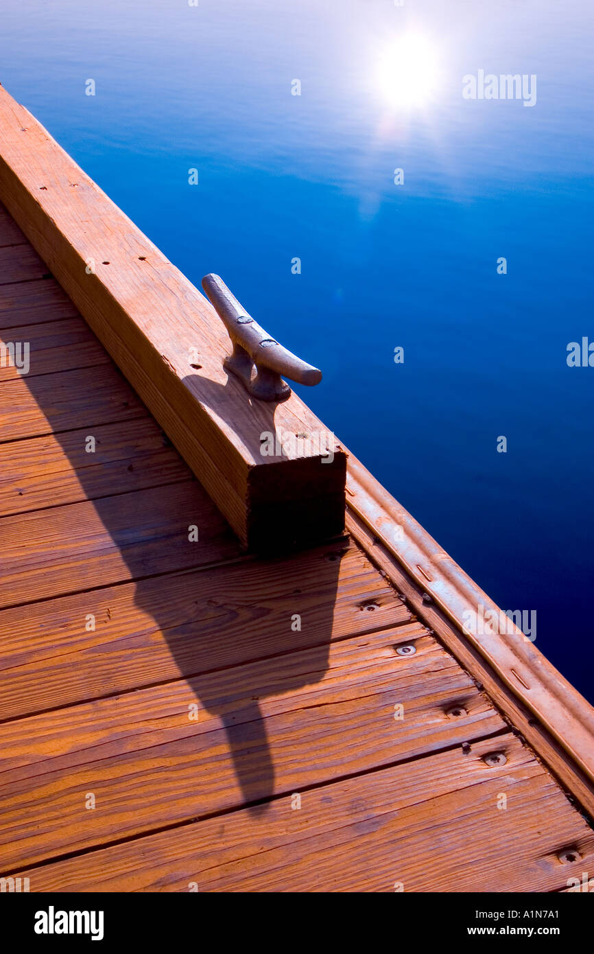 Empty boat dock at sunrise Stock Photo - Alamy
